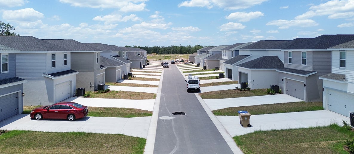 Alley Access Garages & Front Porch Living in St. Cloud, Florida