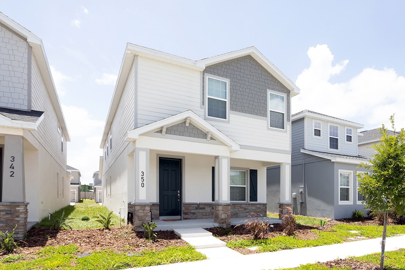 Alley Access Garages & Front Porch Living in St. Cloud, Florida